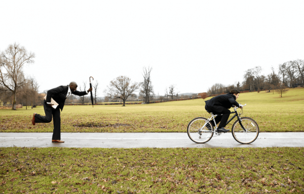 Business man chasing another man - SMI Financial Coaching